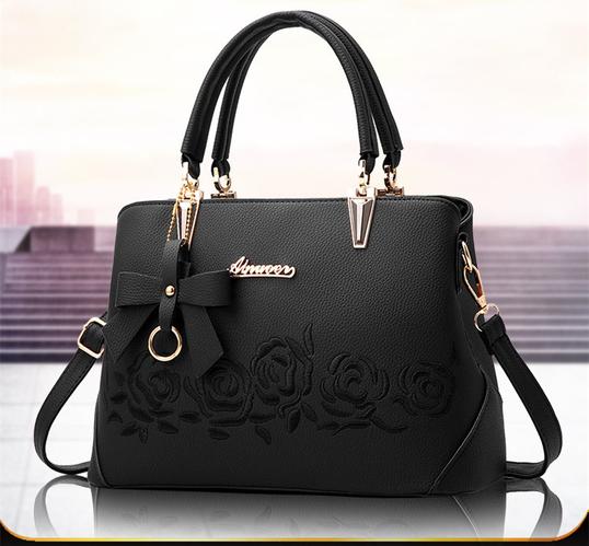 Black Handbag With A Lot Of Compartments