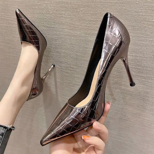 Celeste's Sophisticated Snake Pumps